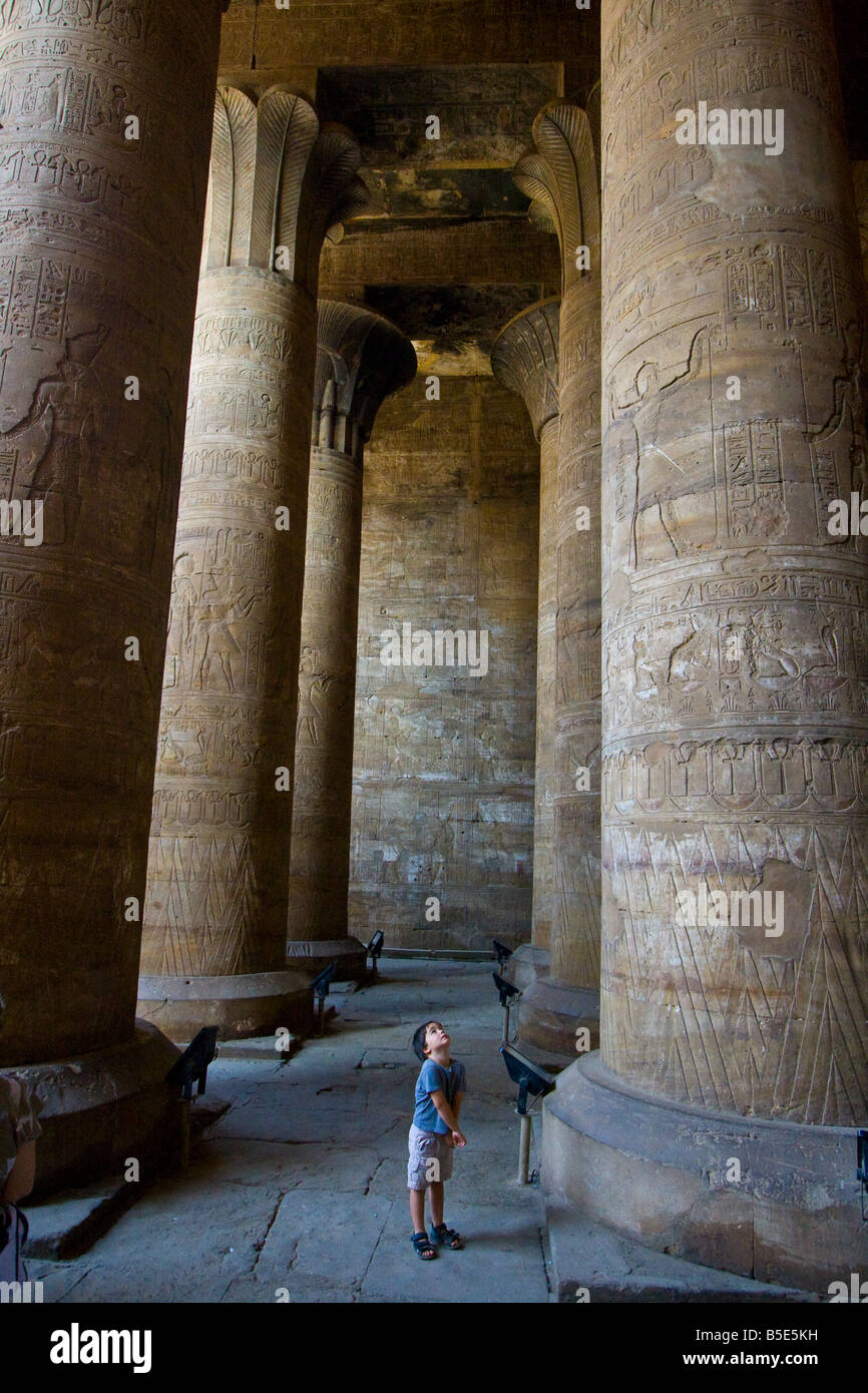 Little Boy and Big Columns at the Temple of Horus in Edfu Egypt Stock ...
