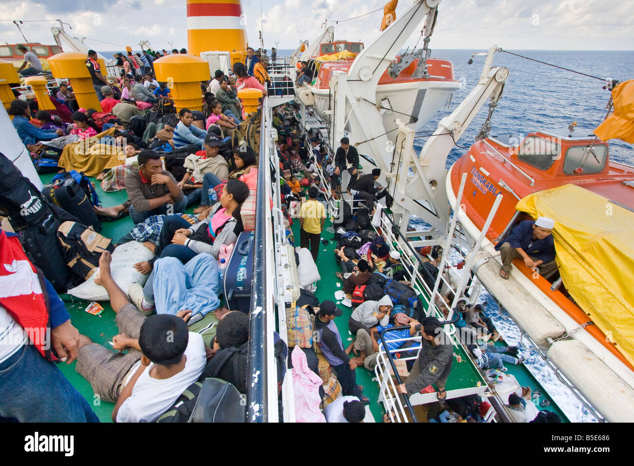 Cramped and Overcrowded PELNI Ferry in Indonesia Stock Photo - Alamy