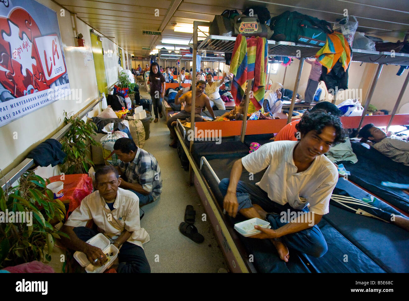 Cramped and Overcrowded PELNI Ferry in Indonesia Stock Photo - Alamy
