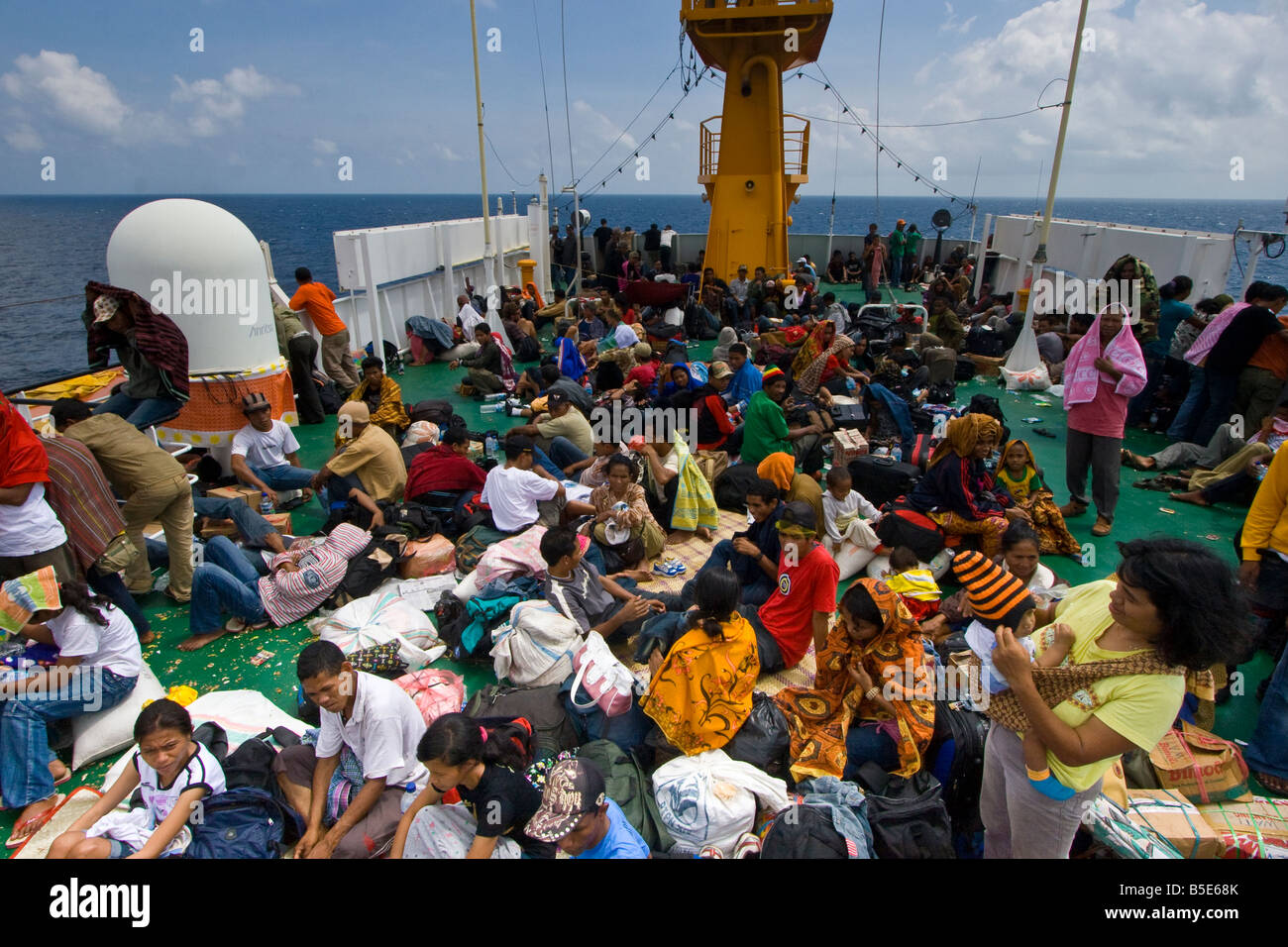 Passengers on an Overcrowded PELNI Passenger Ferry in Indonesia Stock ...