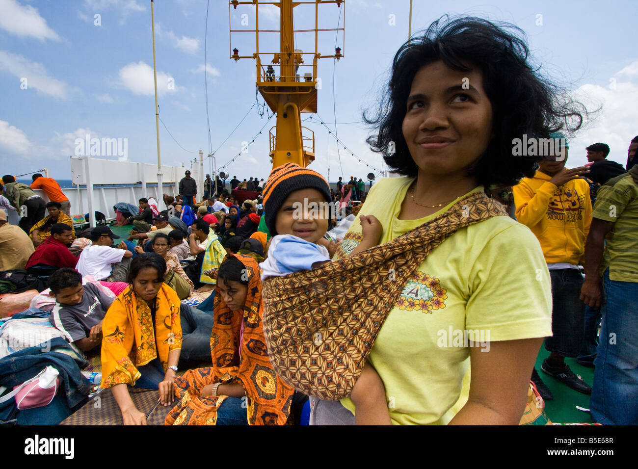 Young Mother on an Overcrowded PELNI Passenger Ferry in Indonesia Stock ...