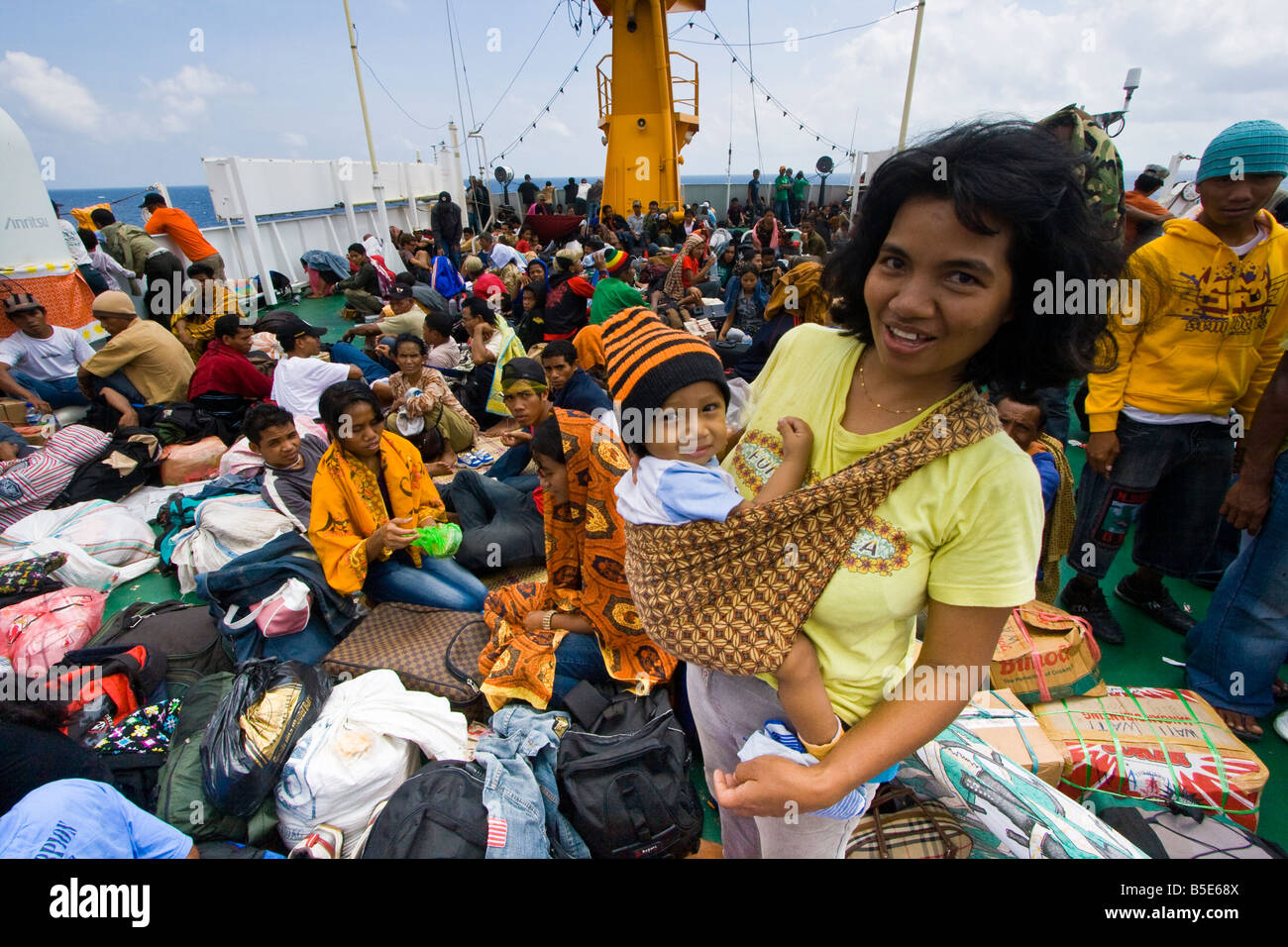 Young Mother on an Overcrowded PELNI Passenger Ferry in Indonesia Stock ...