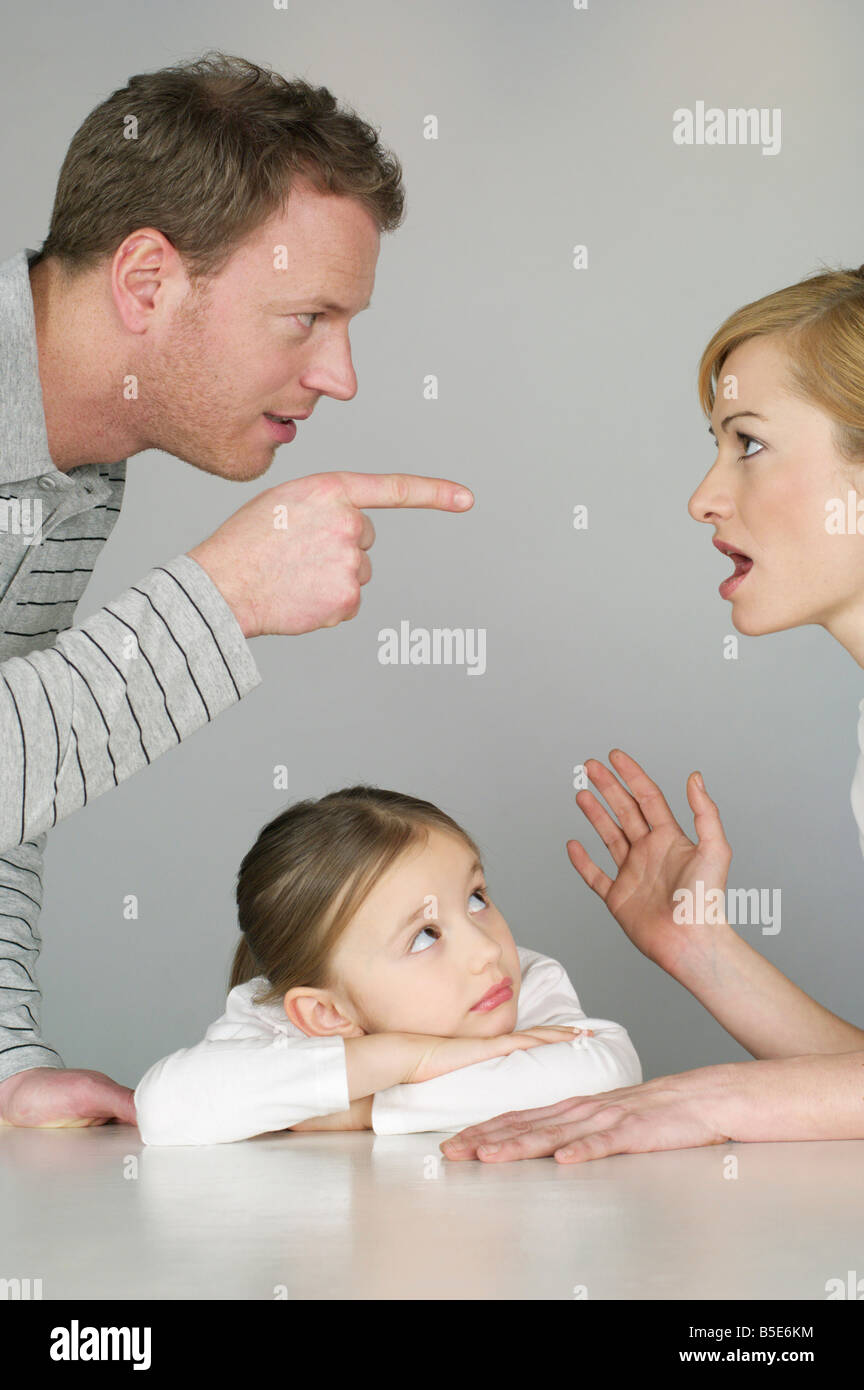 Girl Table Parents Arguing In High Resolution Stock Photography and ...
