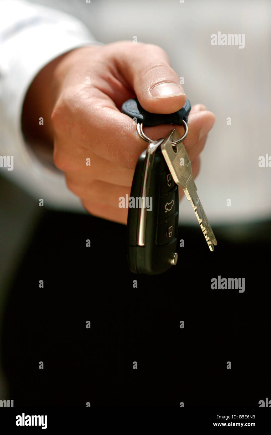 Hand holding bunch keys hi-res stock photography and images - Alamy