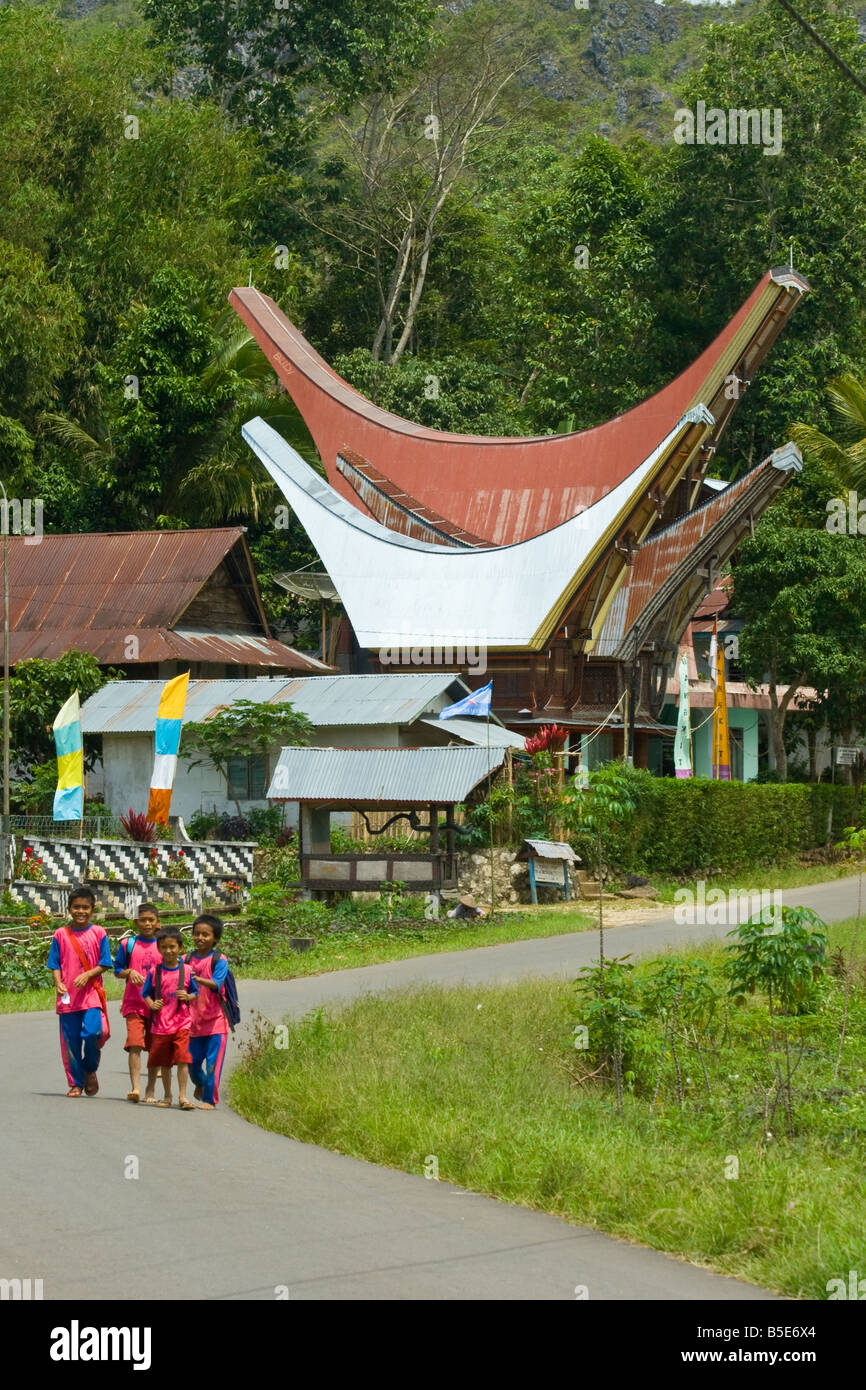 Schoolchildren and a Traditional Tongkonan Home in Tana Toraja on ...