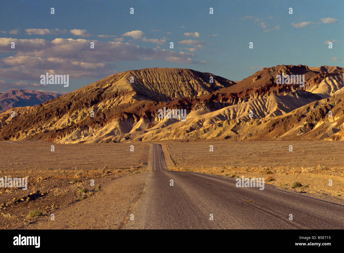 Empty road through Death Valley National Monument California USA G ...