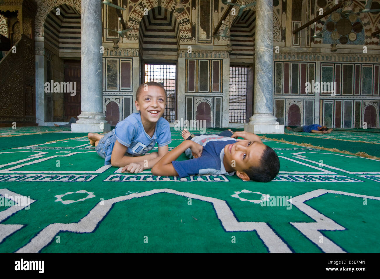 Boys inside the Al Ghouri Mosque and Madrassa in Islamic Cairo Egypt ...