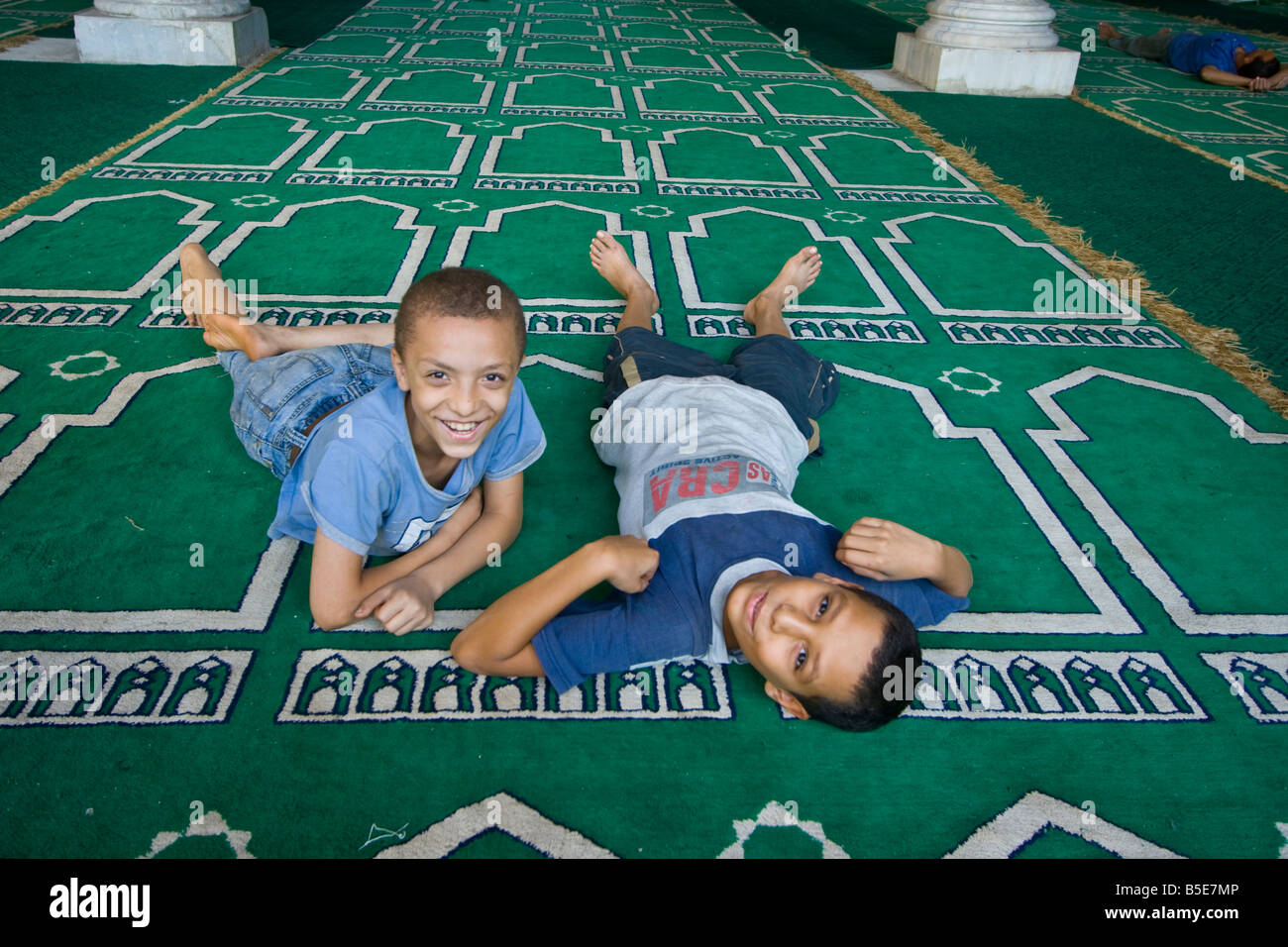 Boys inside the Al Ghouri Mosque and Madrassa in Islamic Cairo Egypt ...