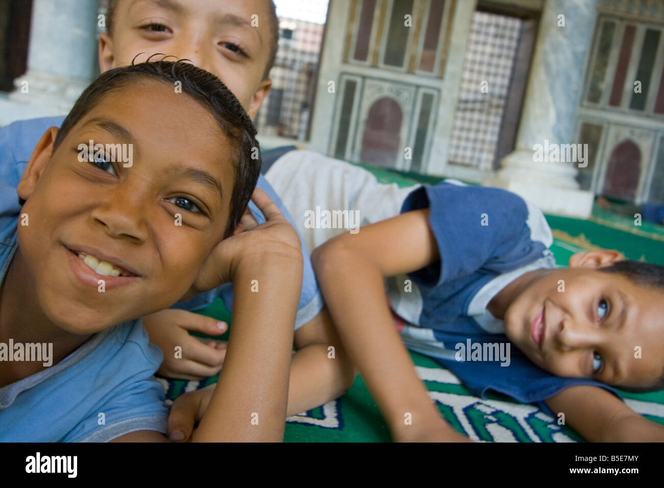 Boys inside the Al Ghouri Mosque and Madrassa in Islamic Cairo Egypt ...