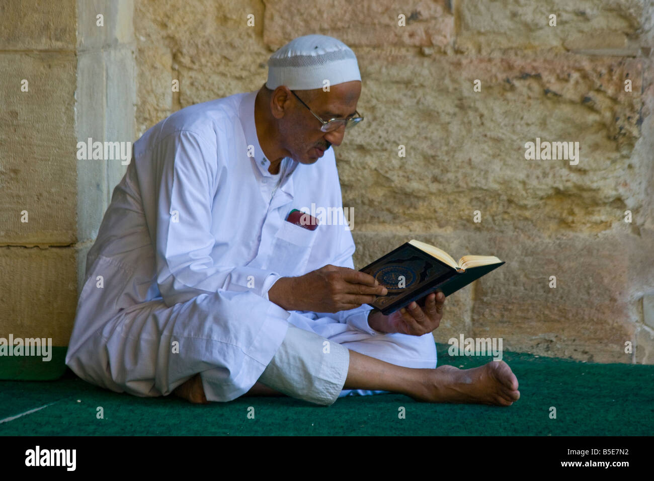 Muslim Man Studying the Quran inside the Al Ghouri Mosque and Madrassa ...
