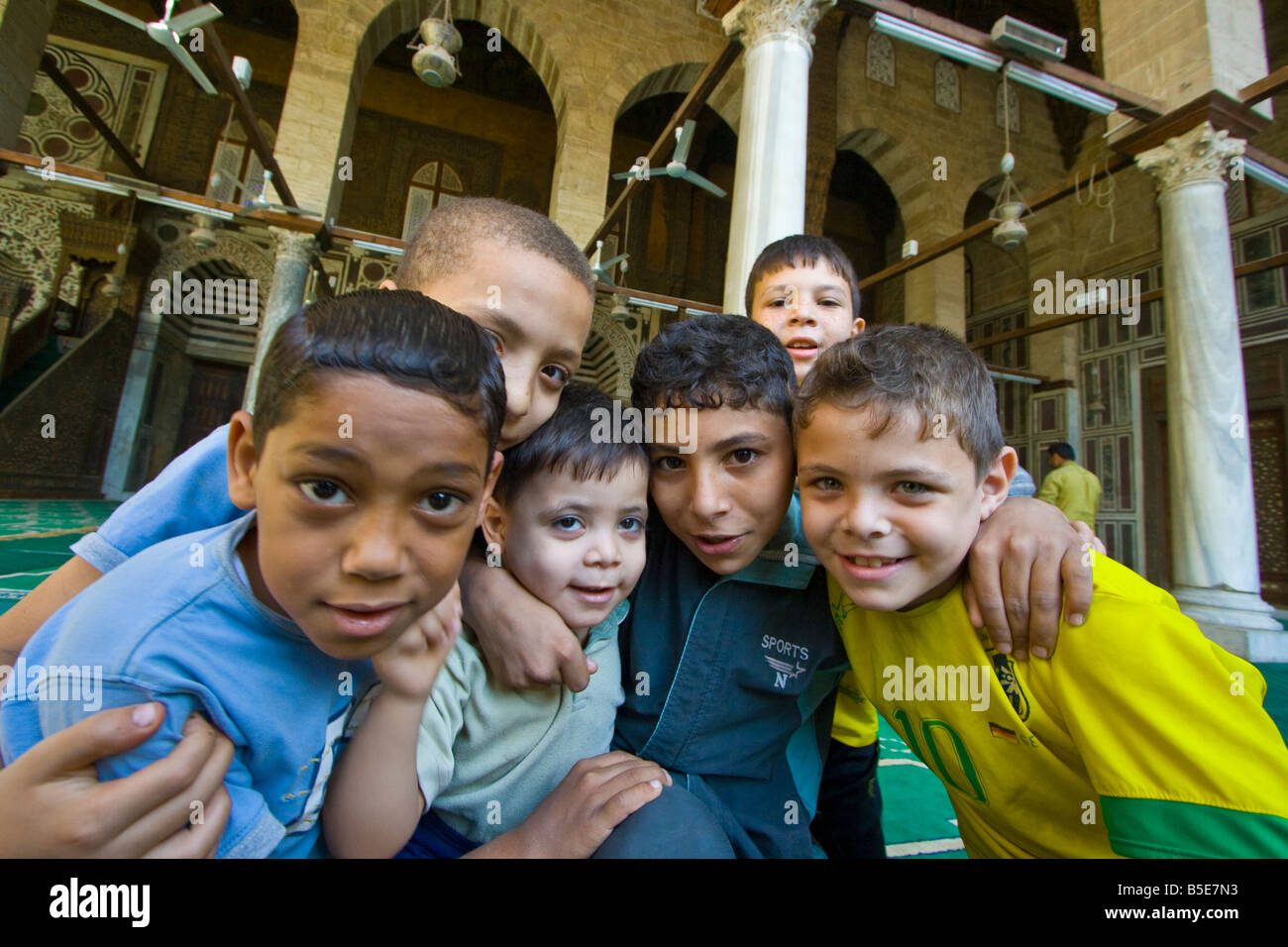Boys inside the Al Ghouri Mosque and Madrassa in Islamic Cairo Egypt ...