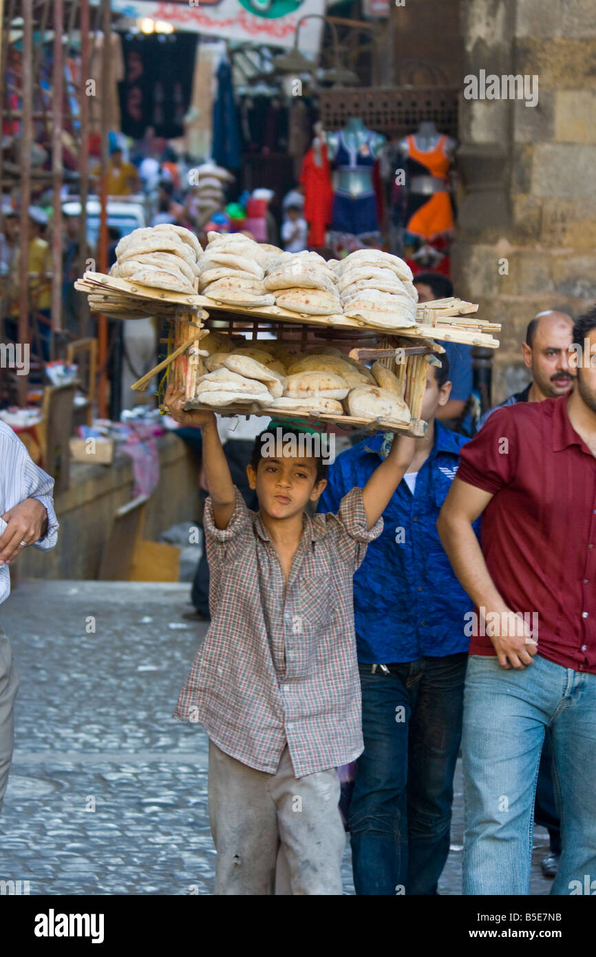 Boy Selling Fresh Bread on the Streets in Islamic Cairo Egypt Stock ...