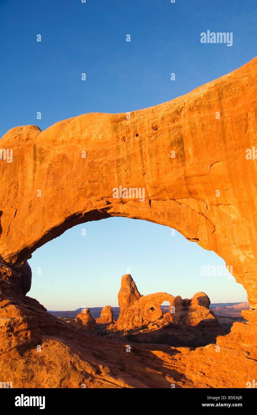 Sunrise on North Arch and Tower Arch in the Windows section of Arches ...
