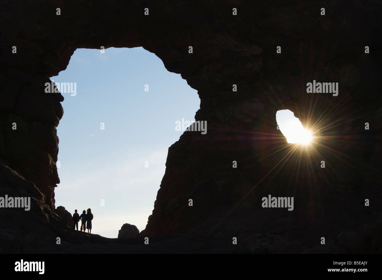 Children exploring South Arch in the Windows section of Arches National ...