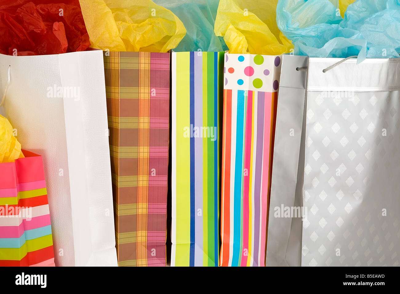 This is a closeup of several colorful shopping bags Stock Photo - Alamy