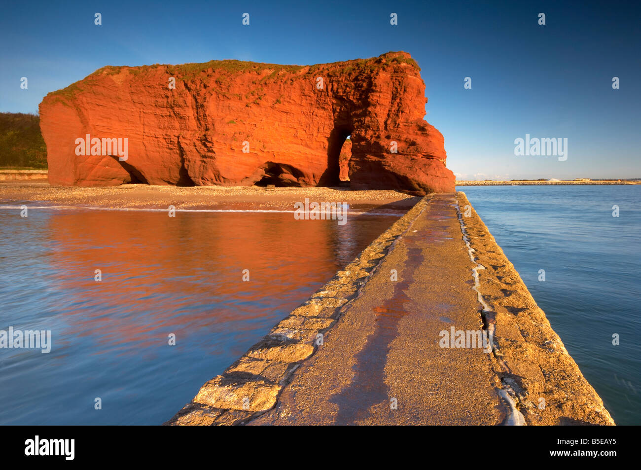 The bright red Langstone Rock on Dawlish seafront viewed fromthe ...
