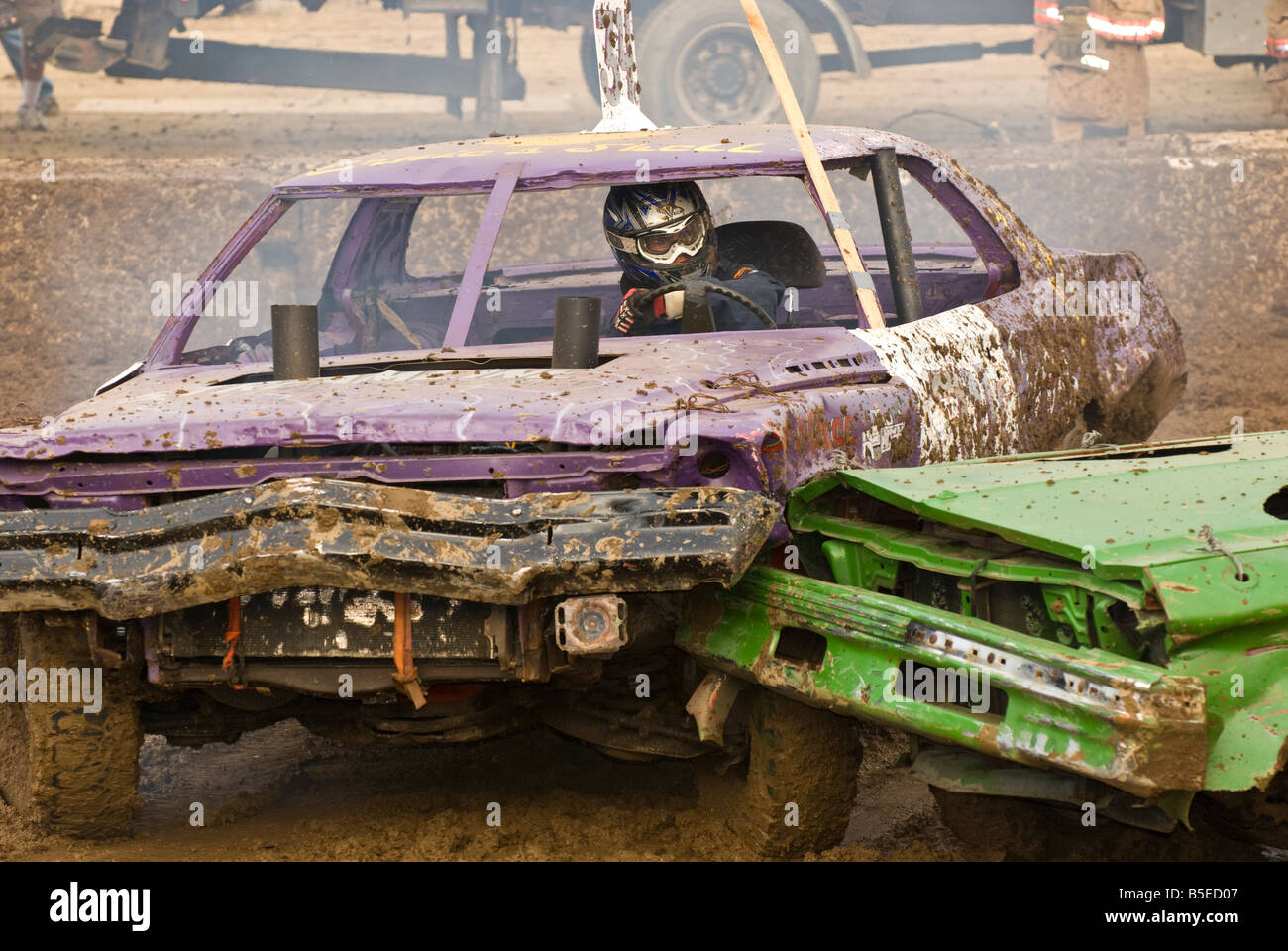 Female driving a car in a demolition derby Stock Photo - Alamy