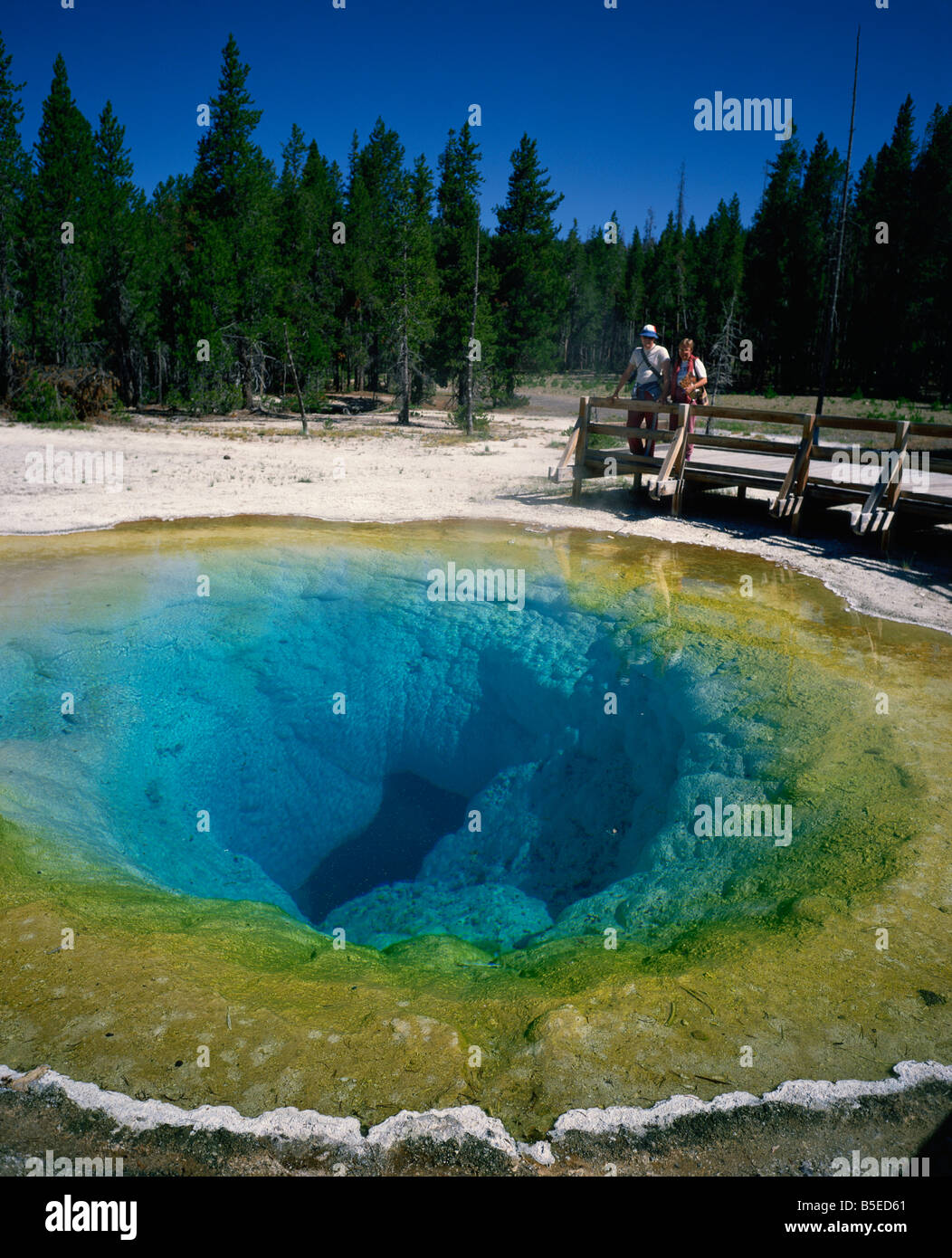 Tourists viewing morning glory pool hi-res stock photography and images ...