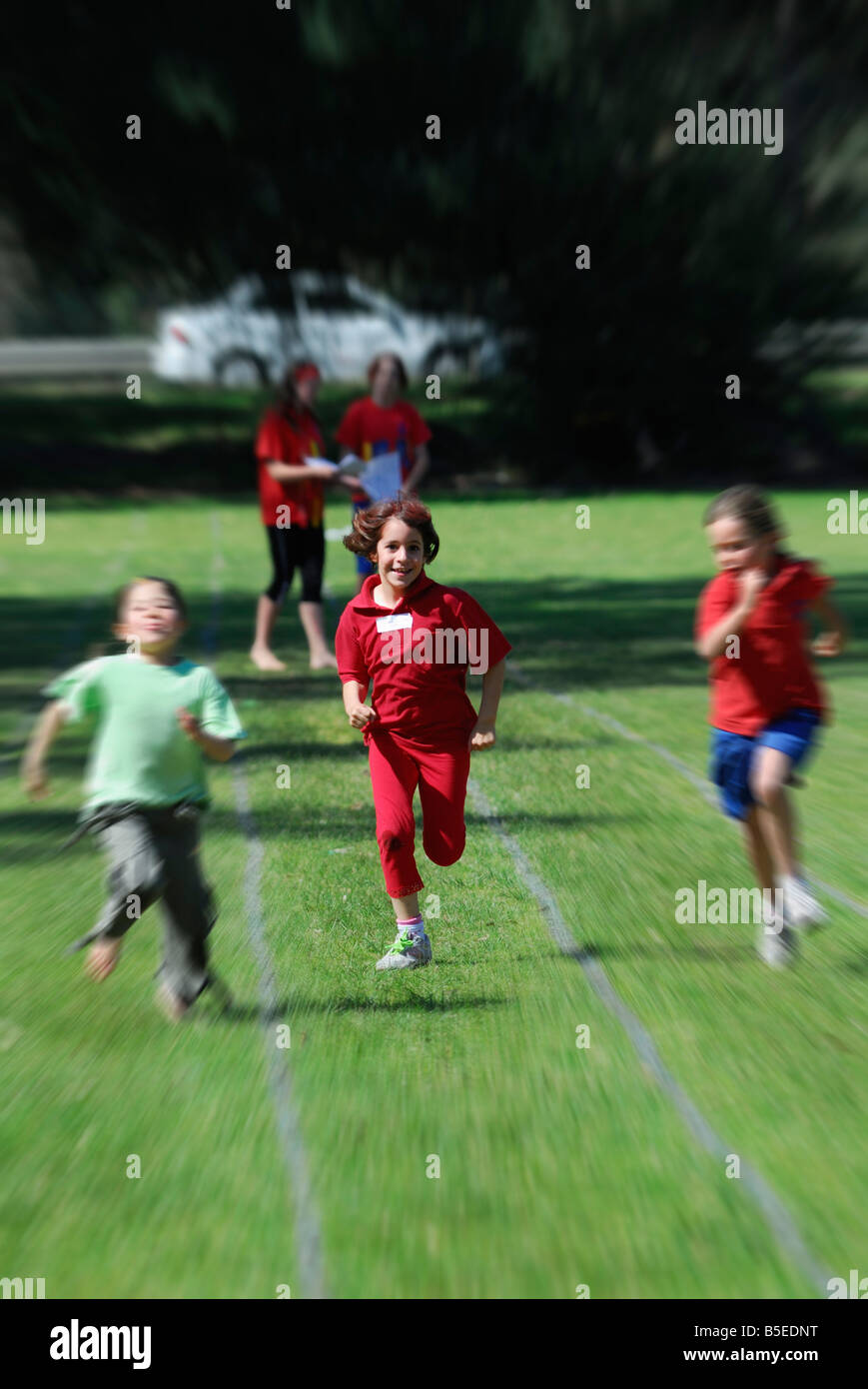 Children running at Primary School Athletics Carnival, Australia Stock ...