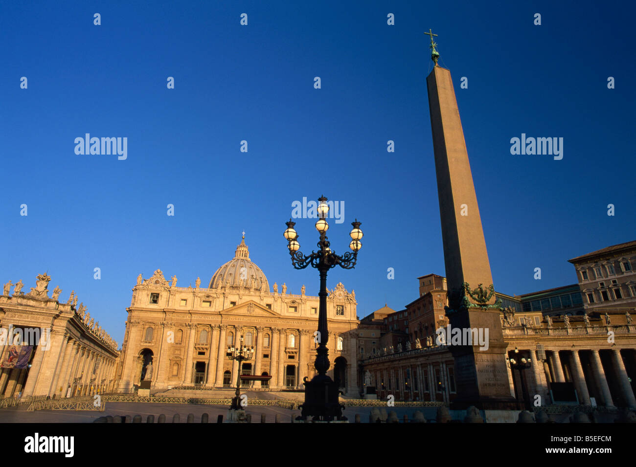 Facade of St. Peter's basilica, with lamp-post and obelisk, St. Peter's ...