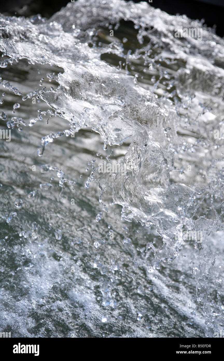 Splashes of water in city fountain Stock Photo - Alamy
