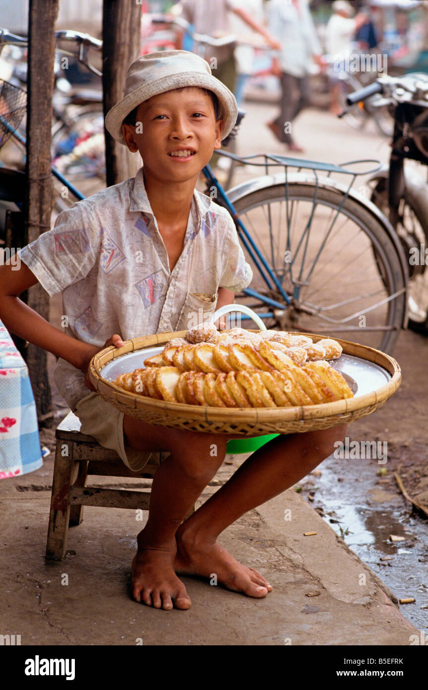 Children selling cakes hi-res stock photography and images - Alamy