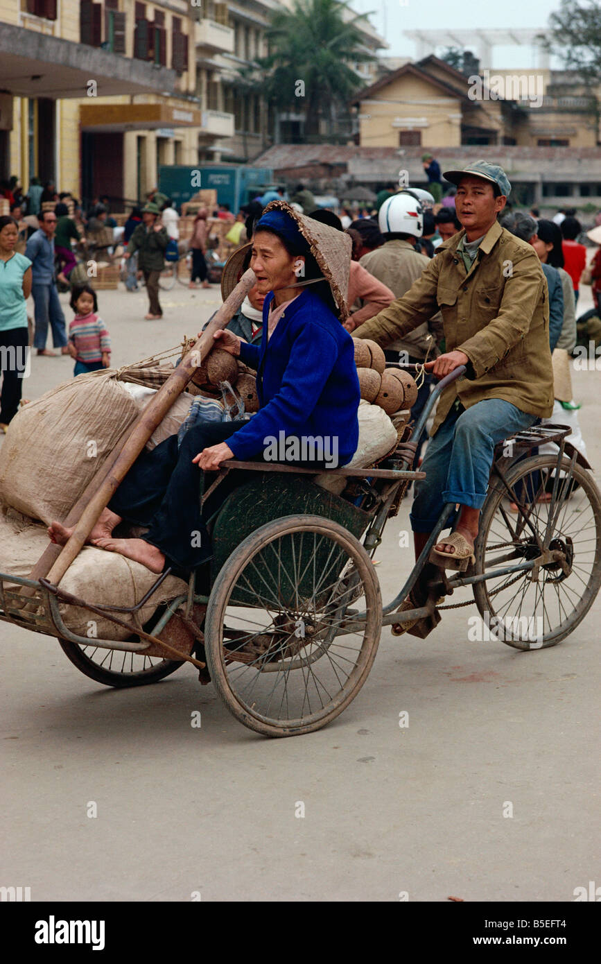 Cyclo pousse driver Hanoi city Vietnam Indochina Southeast Asia Asia ...