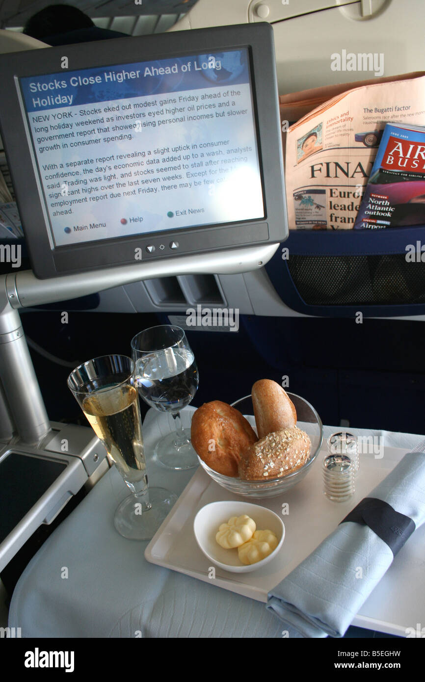 First class cabin dining food Jet Airways plane Stock Photo - Alamy