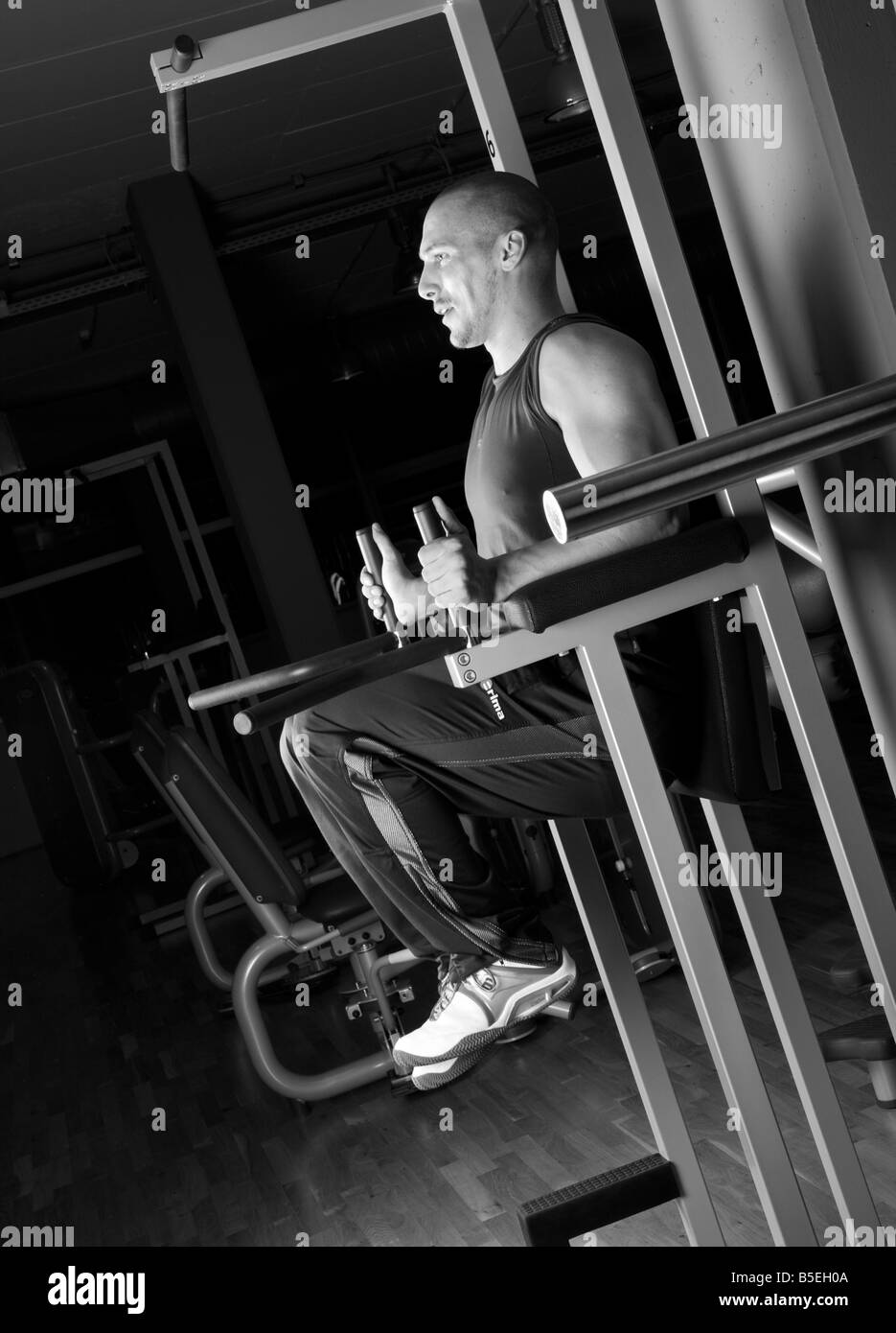 Strong man doing sports Black and White Stock Photos & Images - Alamy