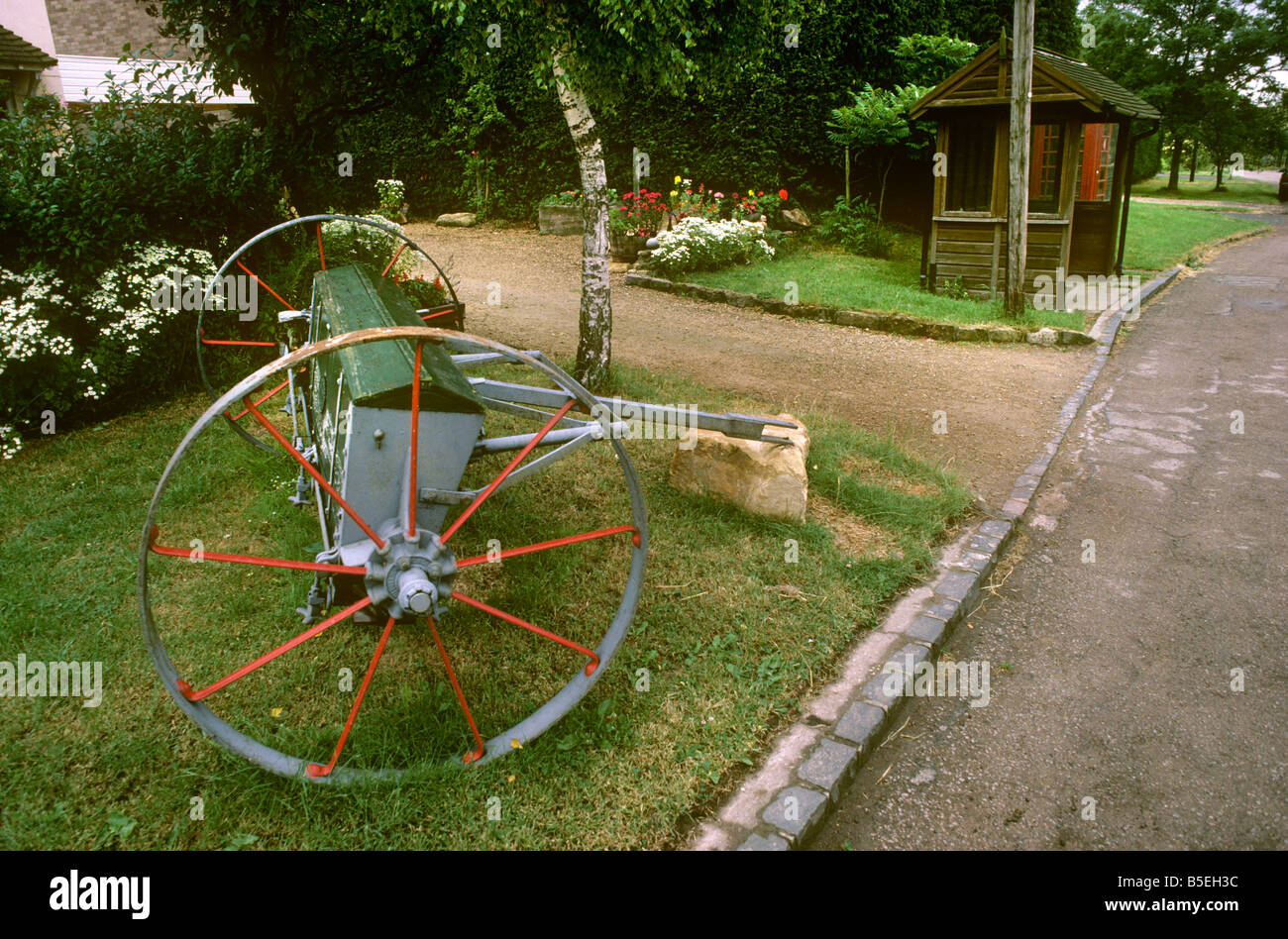 UK England Warwickshire Admington village seed drill outside house near ...