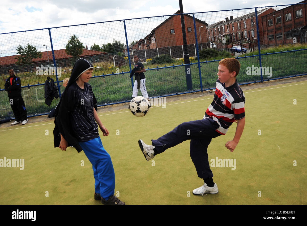 Children playing football uk hi-res stock photography and images - Alamy