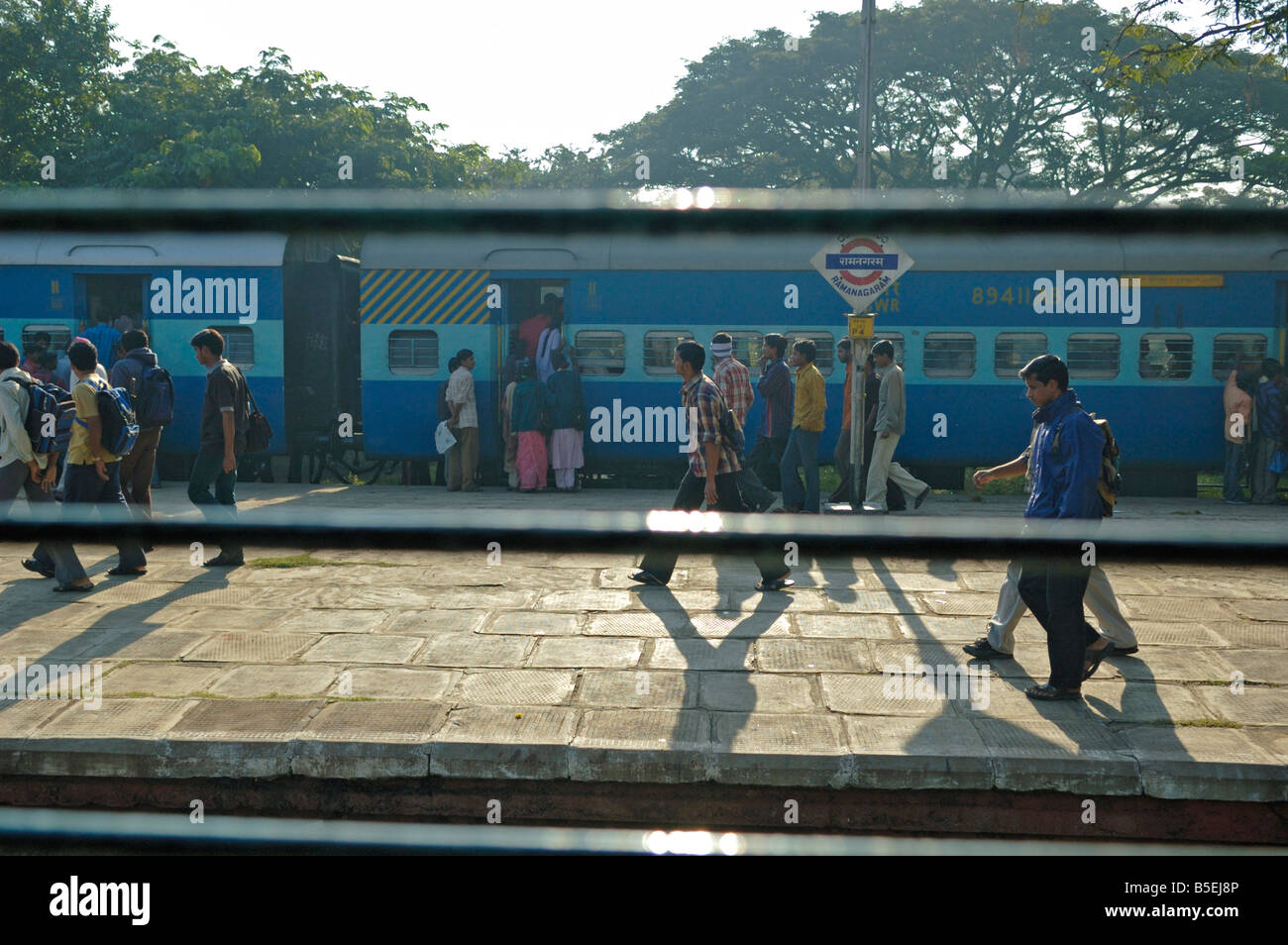 View out of a train carriage of the Mysore Express onta a railway ...