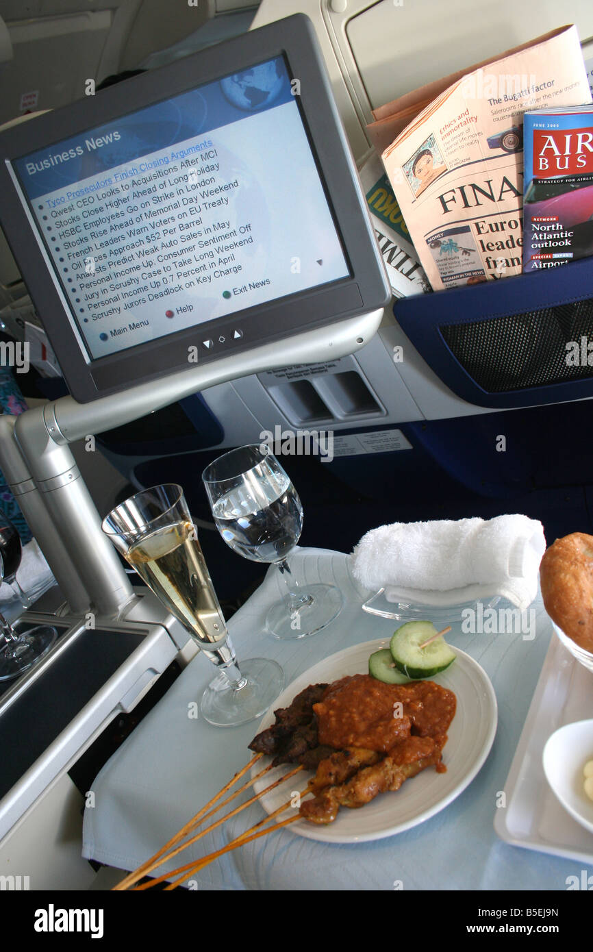 First class cabin dining food Jet Airways plane Stock Photo - Alamy