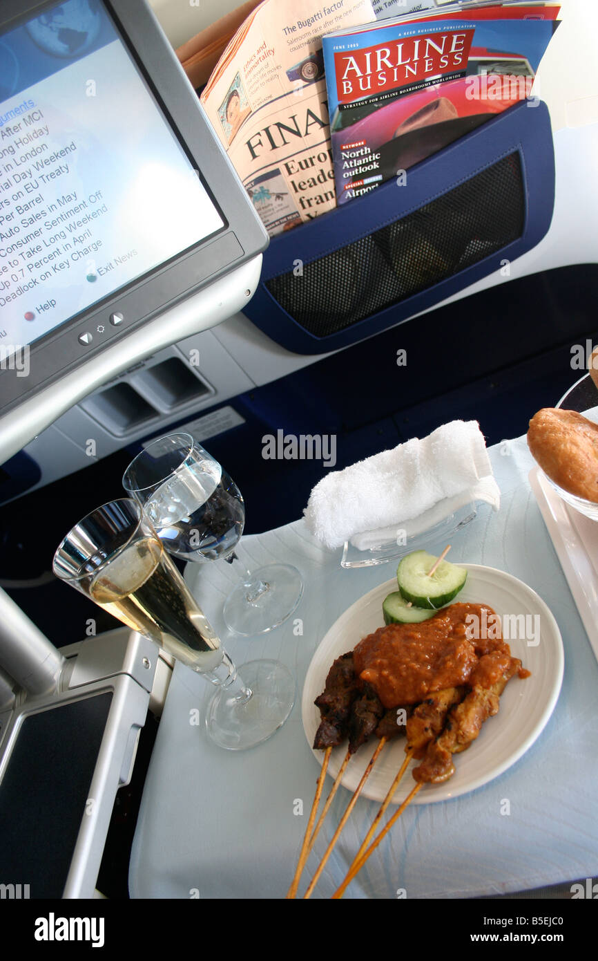 First class cabin dining food Jet Airways plane Stock Photo - Alamy