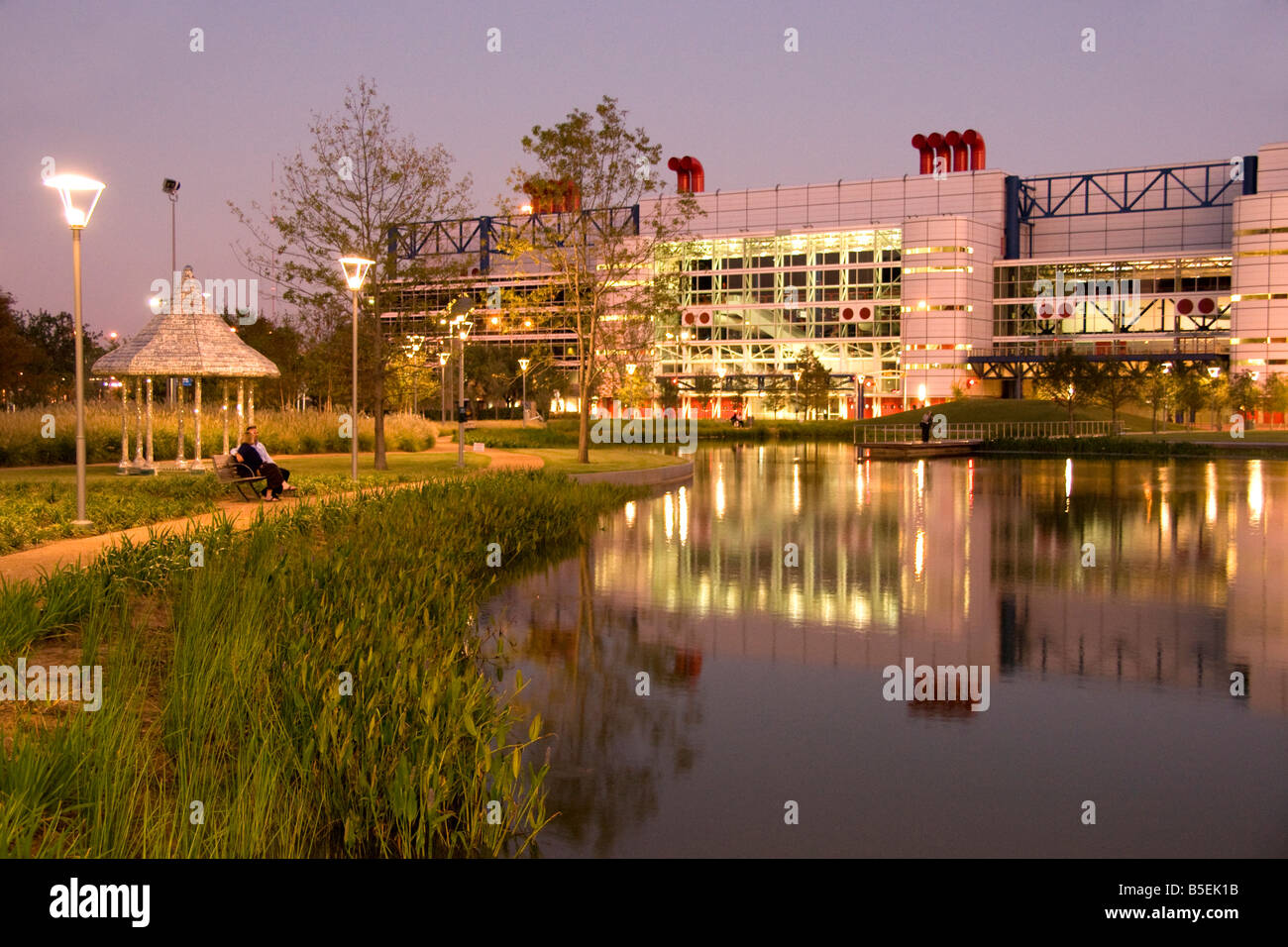 Houston's George R Brown Convention Center reflecting in pond in ...