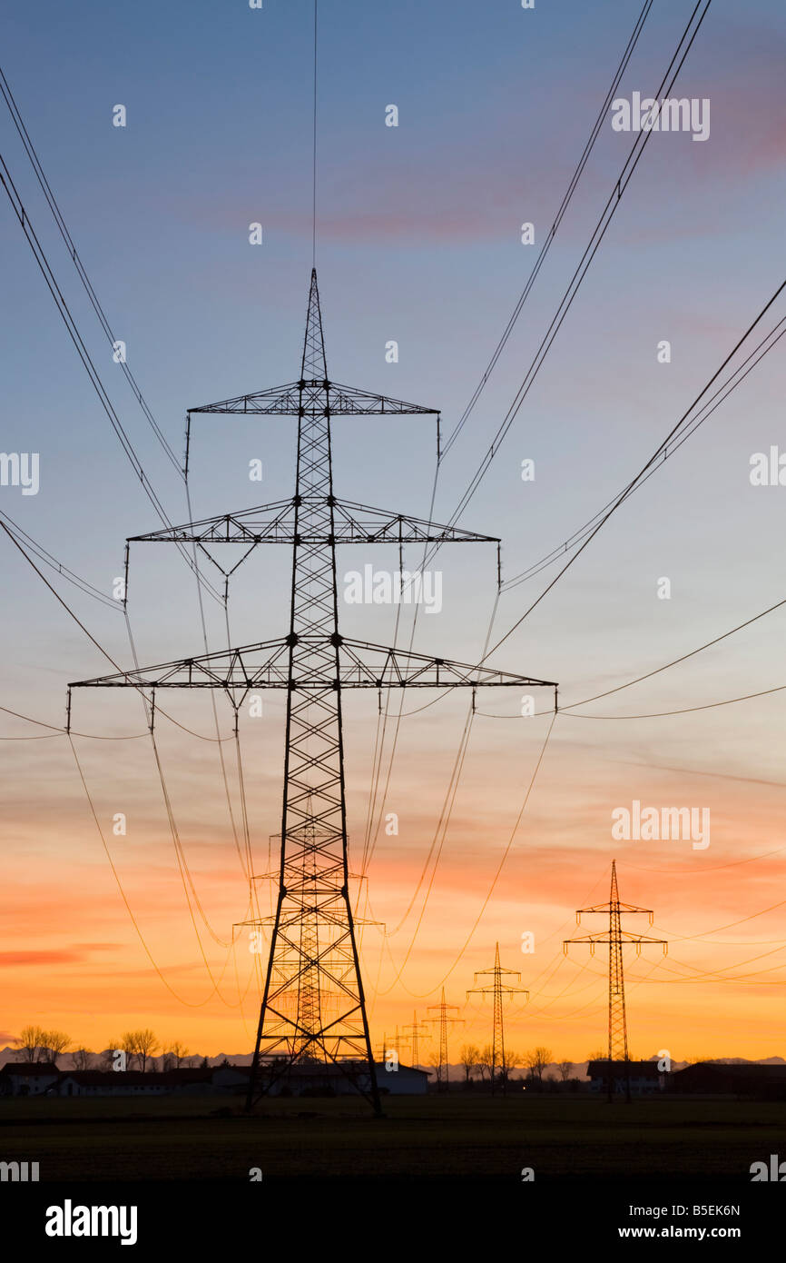 Germany, Bavaria, Pylons at sunset Stock Photo - Alamy
