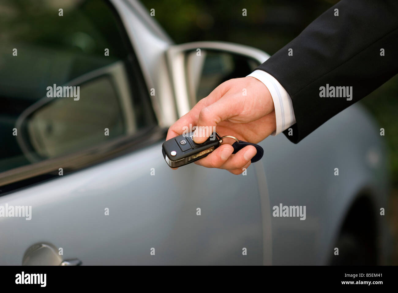 Hand hold car key drivers hi-res stock photography and images - Alamy