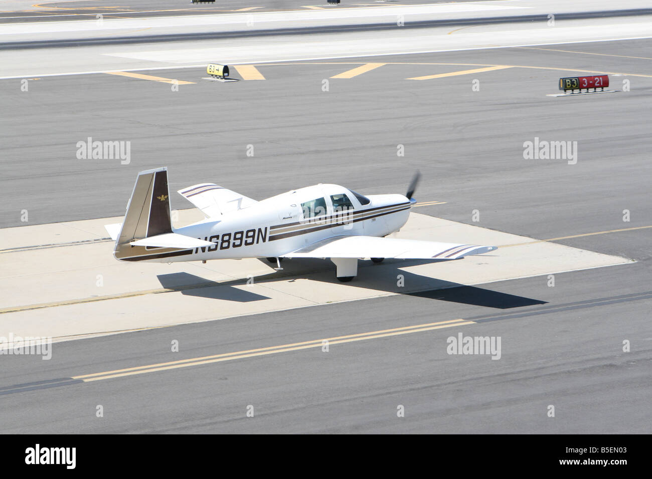 Airplane on runway Stock Photo - Alamy