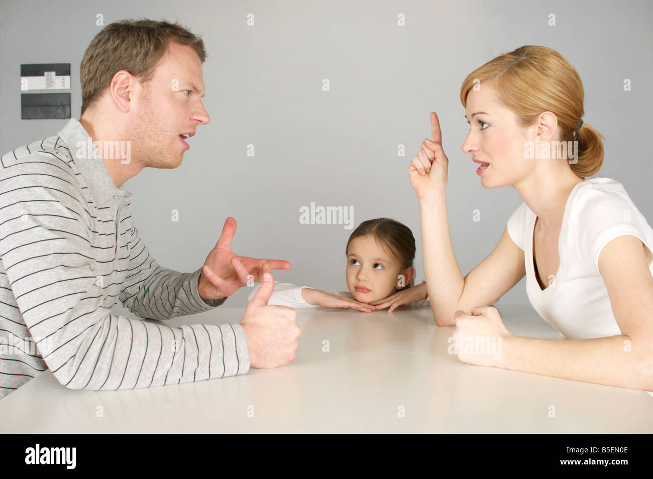 Parents arguing in front children hi-res stock photography and images ...