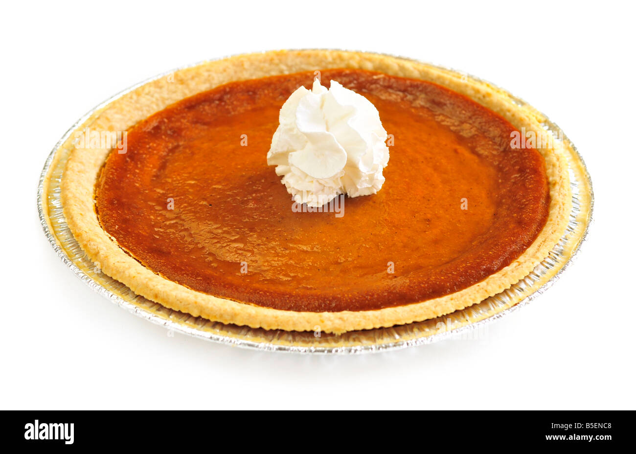 Whole pumpkin pie isolated on white background Stock Photo - Alamy