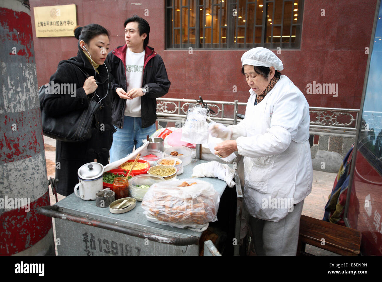 A street stall with Chinese snacks in Shanghai, China Stock Photo - Alamy