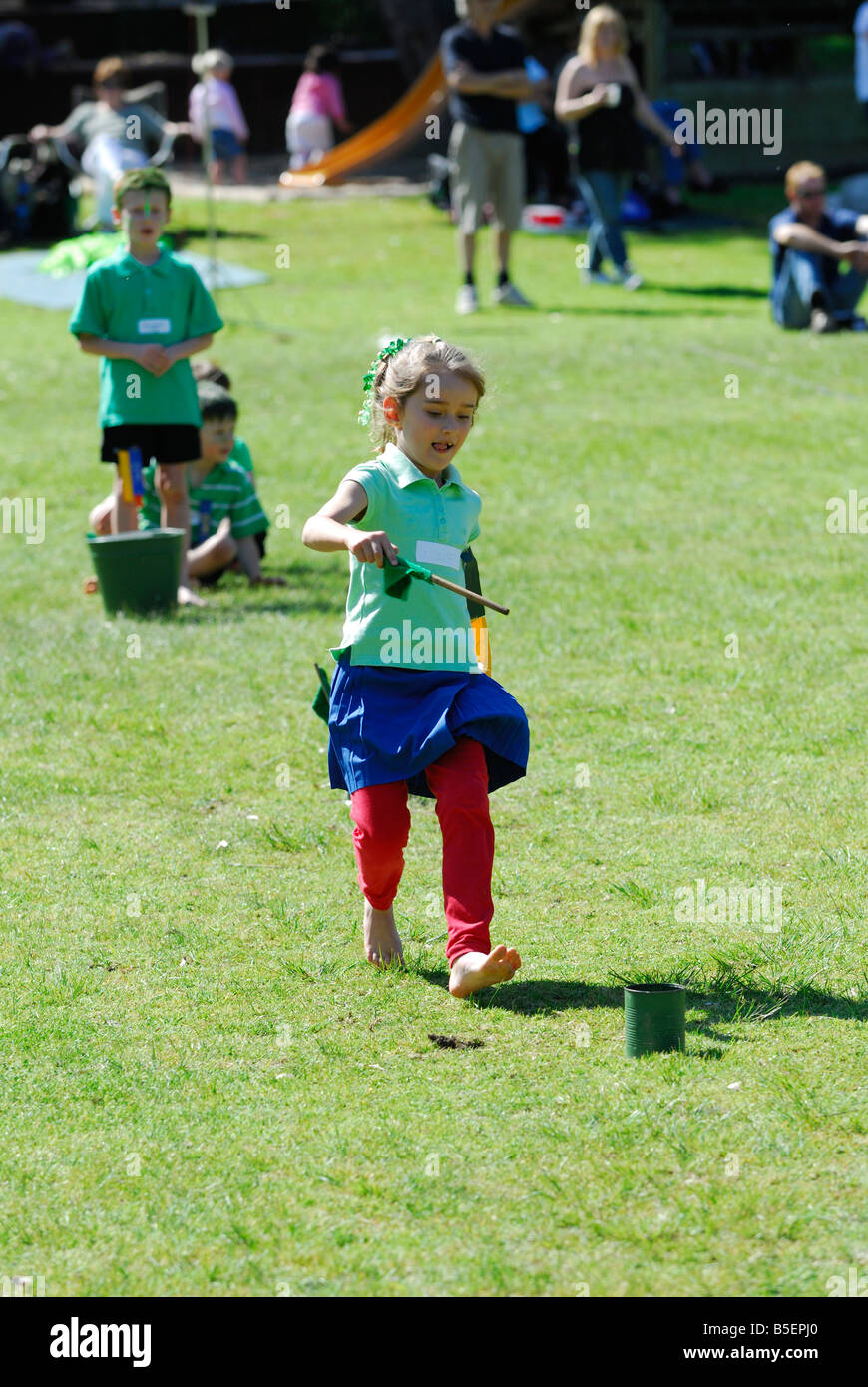 Child competing in flag race at Primary School Athletics carnival ...