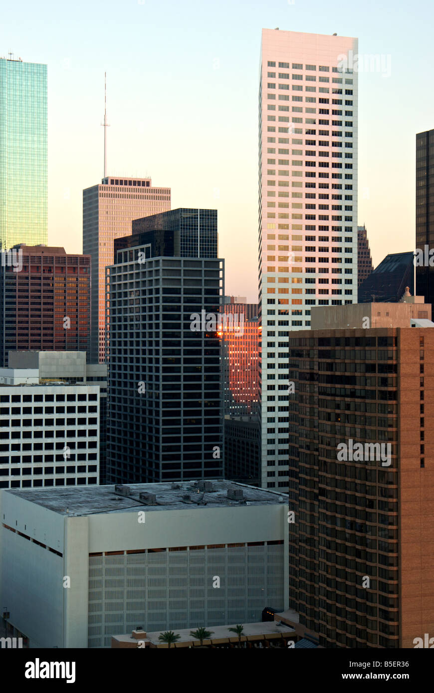 The highrise buildings of downtown Houston reflecting the colors of the ...