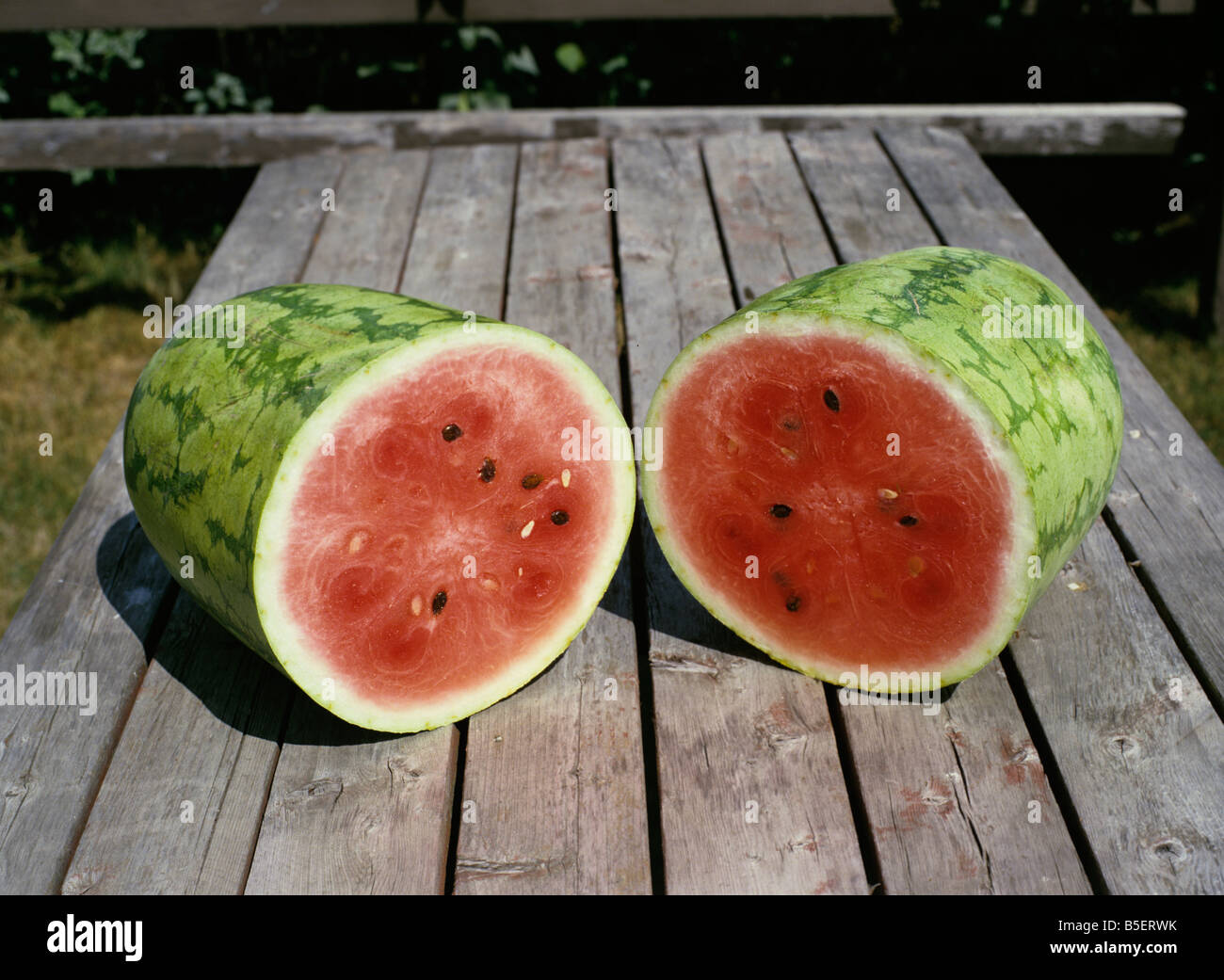 Watermelon melon cut half market hi-res stock photography and images ...