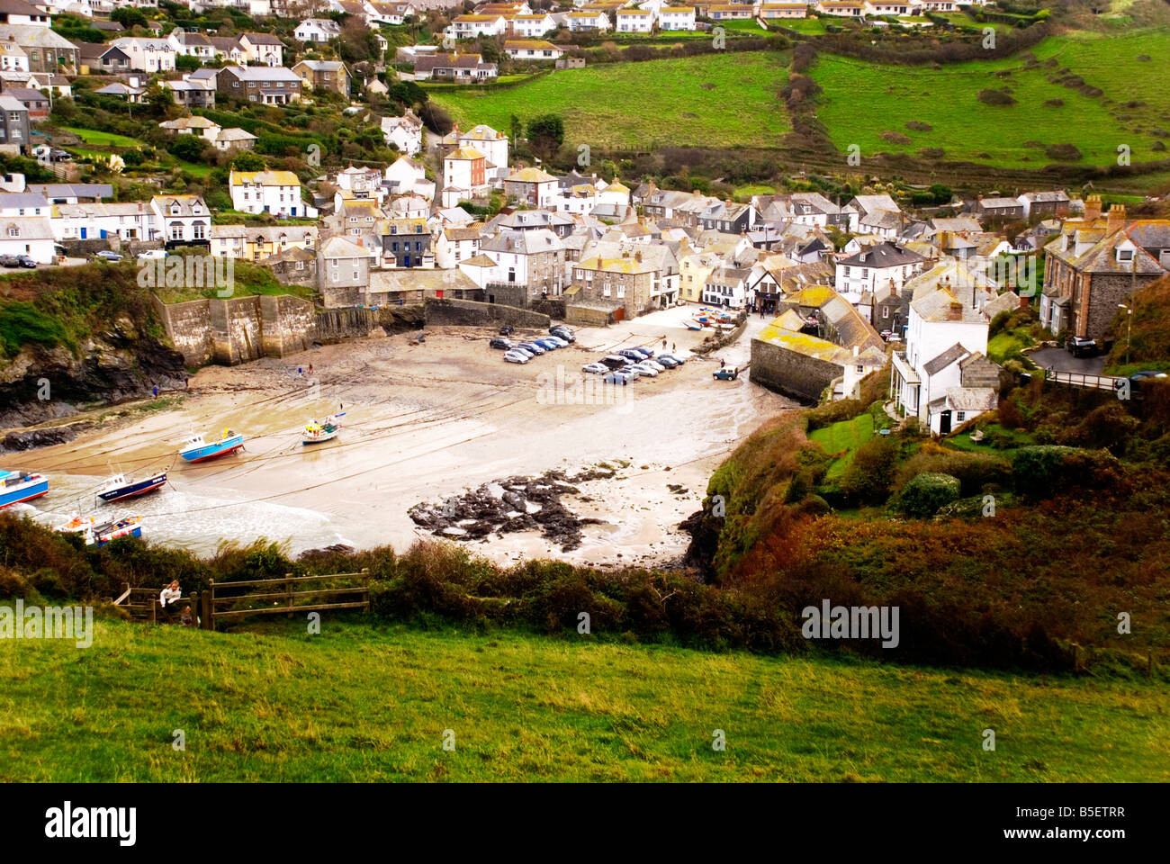 Port Isaac Cornwall England UK Fishing boats in the harbour and the old ...