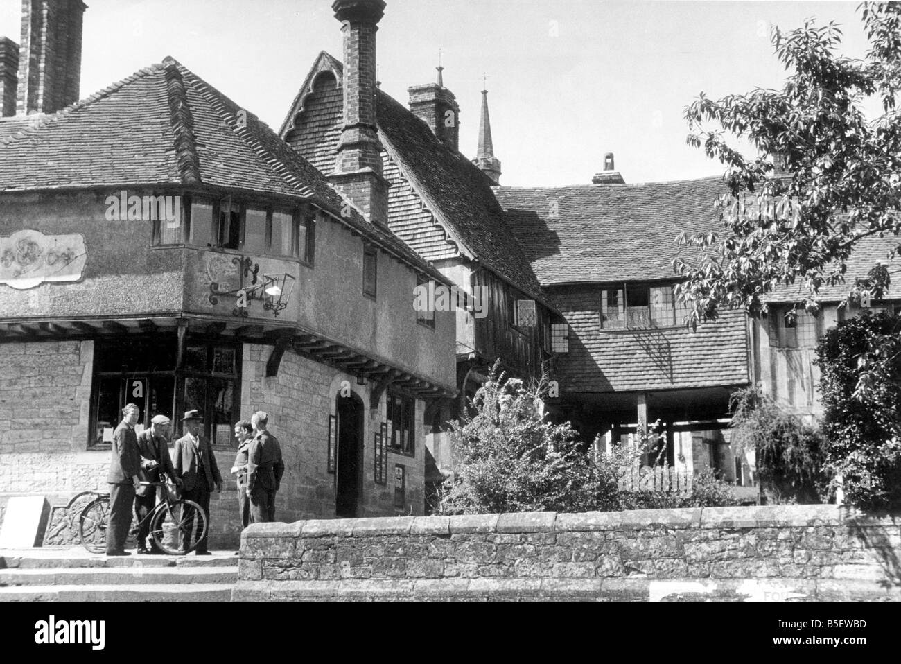 Locals gathered outside the post office in Leicester Square in the ...