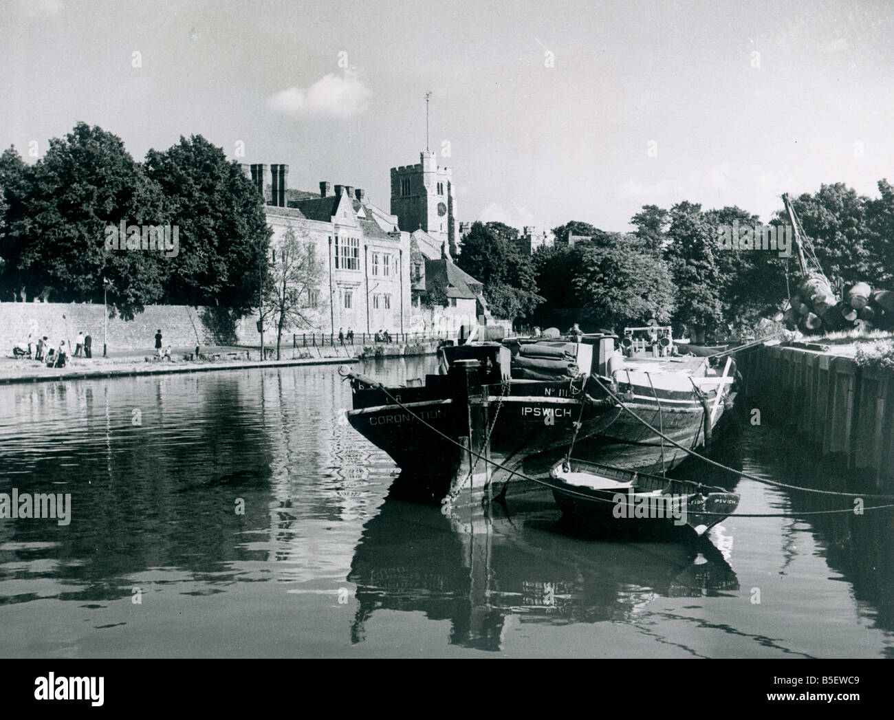 A boat in the harbour on the River Medway beneath Maidstone Church in ...