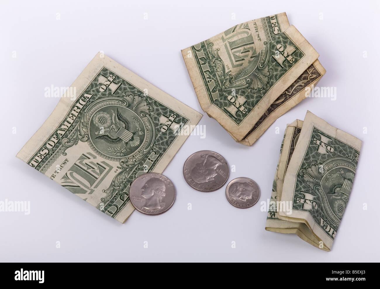 some cash last money one dollar notes and coins Stock Photo - Alamy