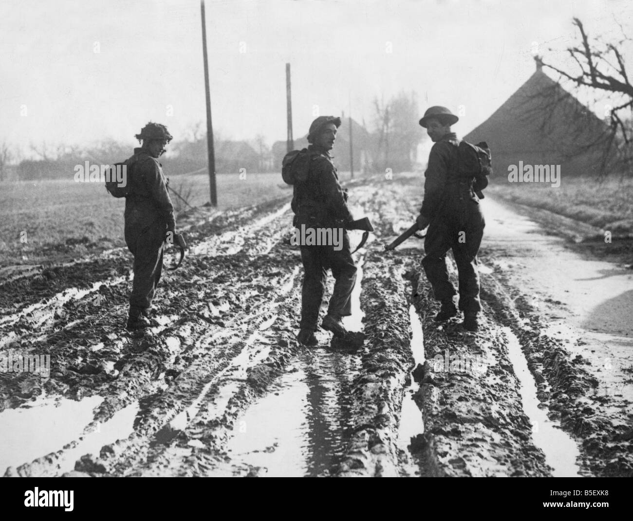 Walking through mud Black and White Stock Photos & Images - Alamy