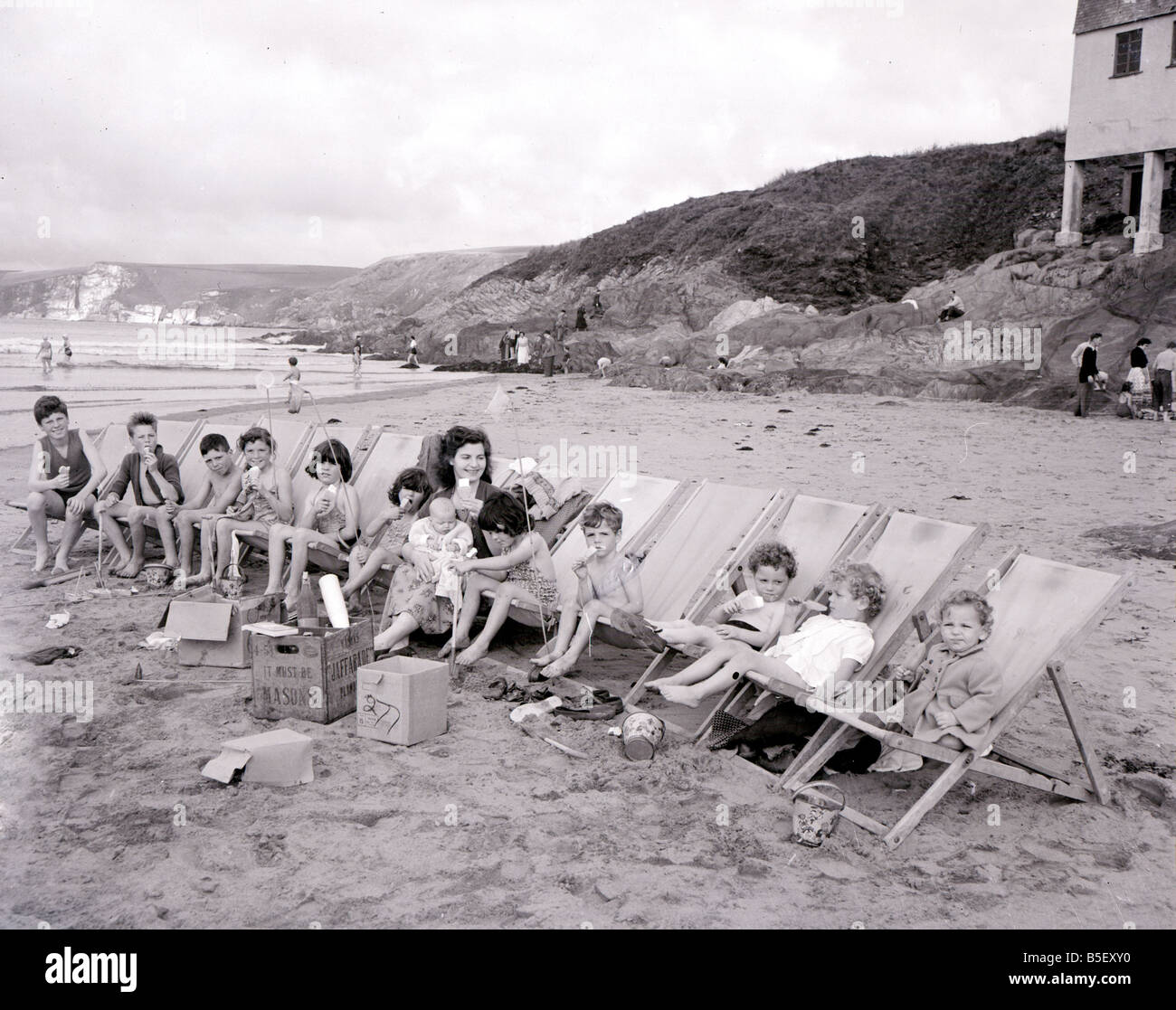Mrs Mavis Graham and her 12 children seen here having a picnic beside ...